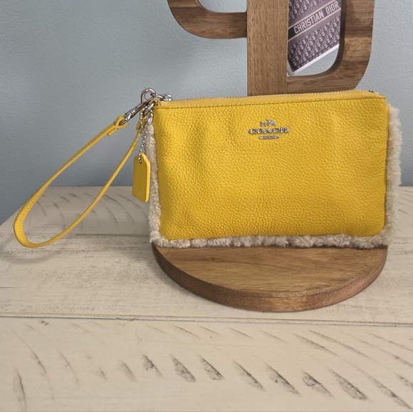 Coach | Bags | Coach Shearling Wristlet Yellow Pebbled Leather Yellow ...
